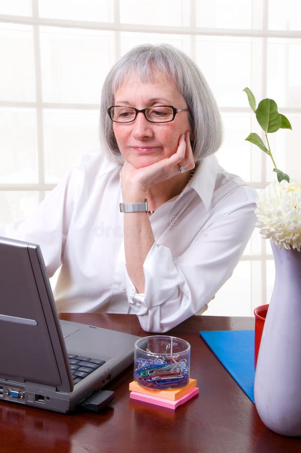 Young Lady in Office Style Sitting on Modern Chair with a Cup of Coffee ...