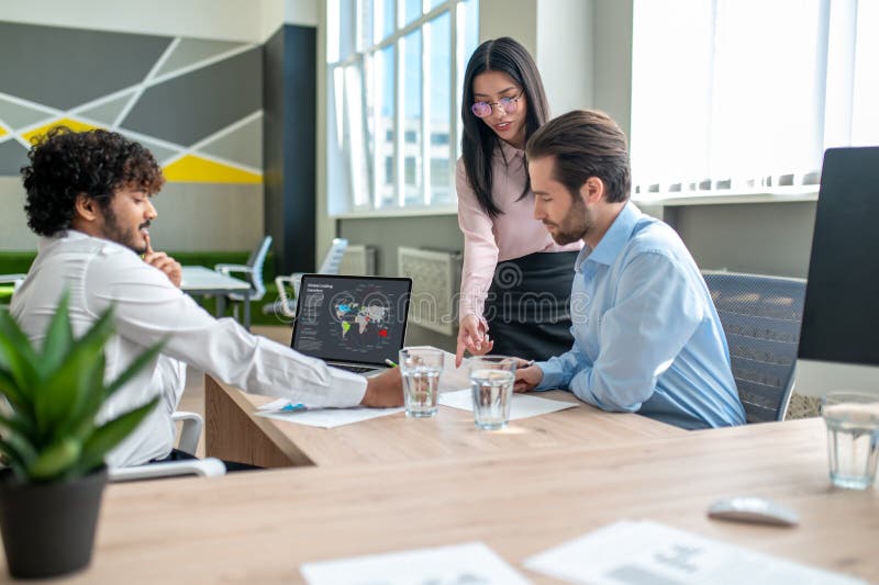 Team of Professionals Working Together in the Office Stock Photo ...