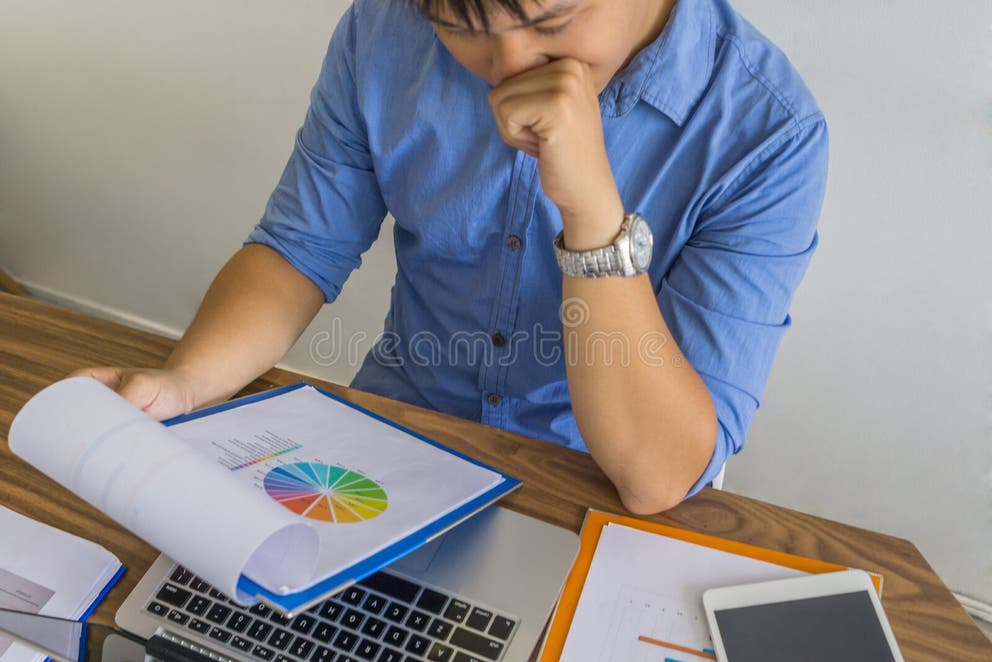 Office Man Reading Financial Document Report Document Stock Photo ...
