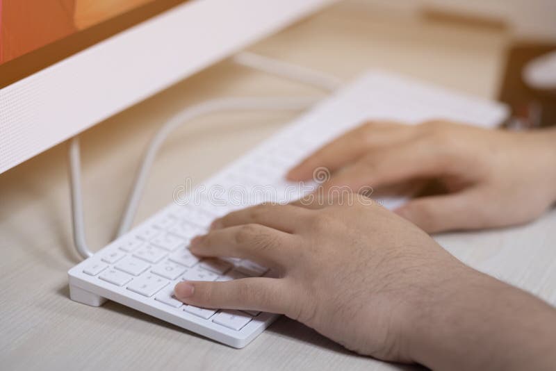 The Office Man Typing Something on White Computer Keyboard in Office ...