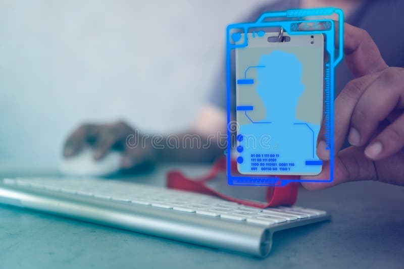 Office Man Using a Computer and Showing His Staff Identity Card before ...