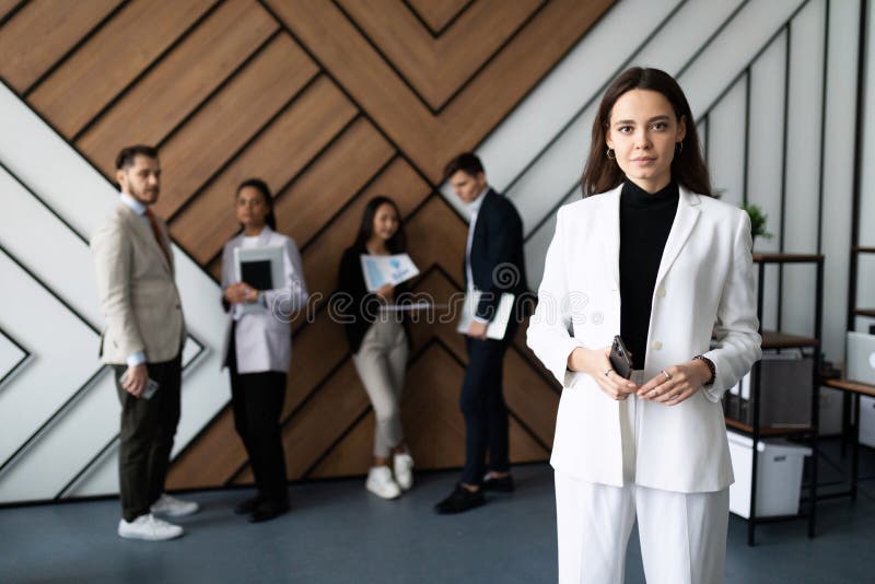 Office Manager Against the Background of Employees Waiting for an ...