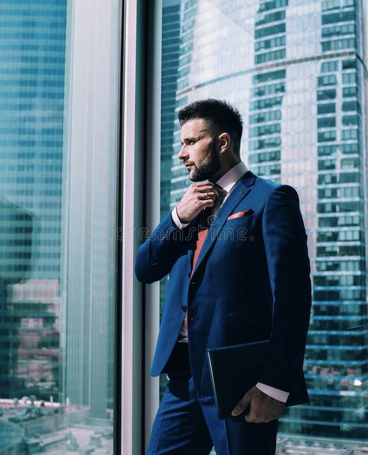 Office Manager Looking Out Window on City Stock Photo - Image of ...