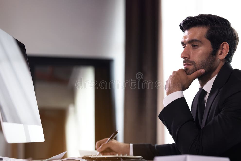 Office Manager Working on Computer at His Desk Stock Image - Image of ...