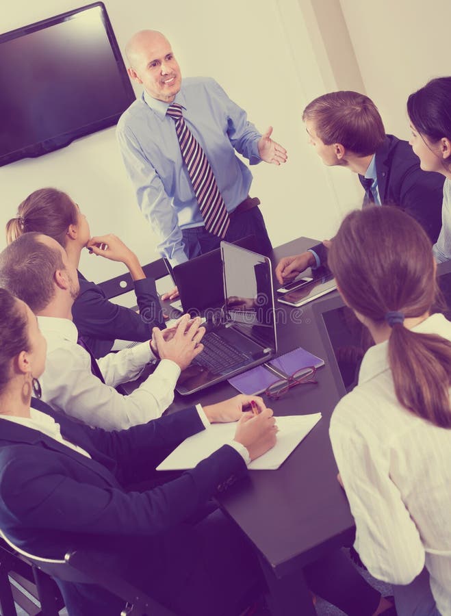 Office Managers Talking about Business Project Stock Photo - Image of ...