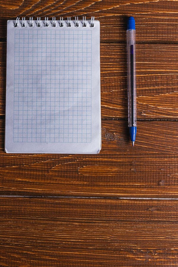 Office Notebook and Pen on a Brown Table Stock Image - Image of multi ...