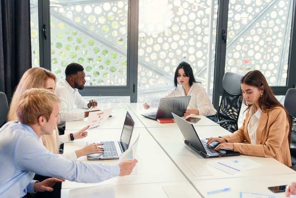 Office People Being Absorbed in Their Work at the Conference Table ...