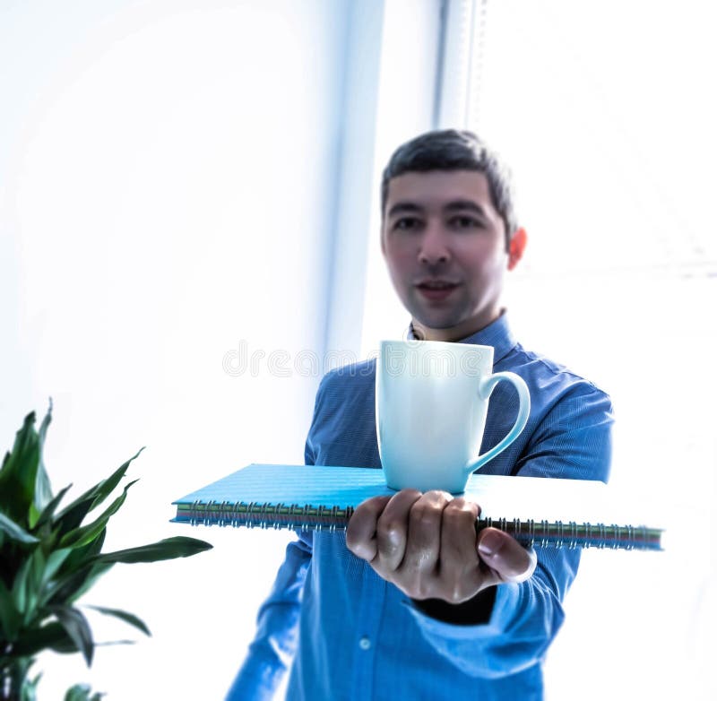 Office Worker Offering Coffee Stock Image - Image of shirt, phone ...