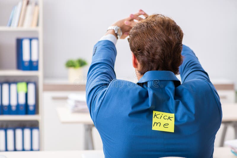 The Office Prank with Kick Me Message on Sticky Note Stock Image ...