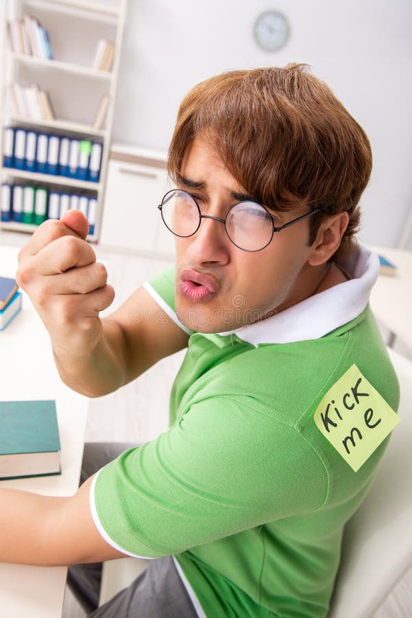 The Office Prank with Kick Me Message on Sticky Note Stock Image ...