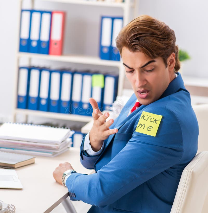 Office Prank with Kick Me Message on Sticky Note Stock Image - Image of ...