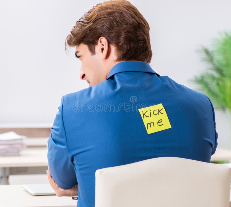 Office Prank with Kick Me Message on Sticky Note Stock Image - Image of ...