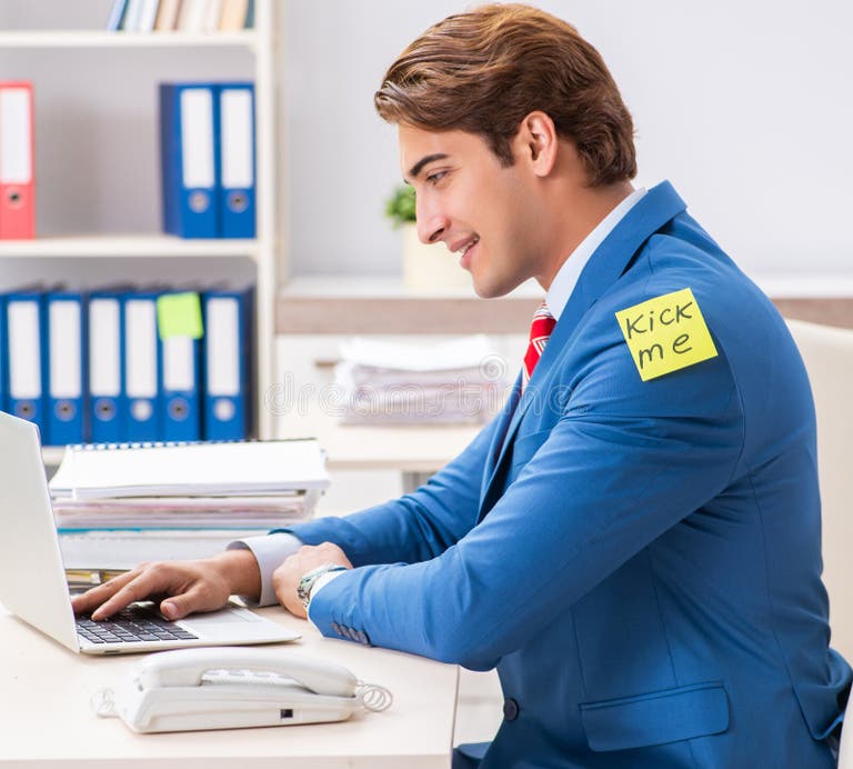 Office Prank with Kick Me Message on Sticky Note Stock Photo - Image of ...