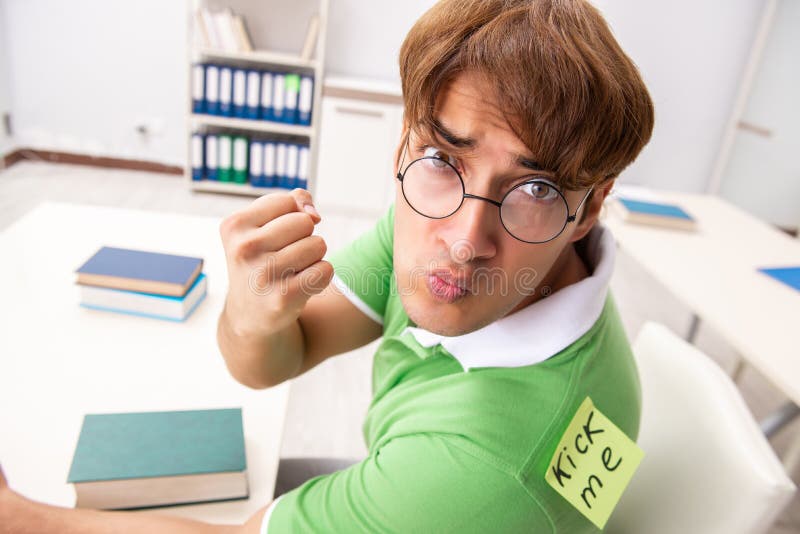 The Office Prank with Kick Me Message on Sticky Note Stock Image ...