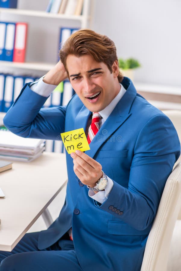 The Office Prank with Kick Me Message on Sticky Note Stock Image ...