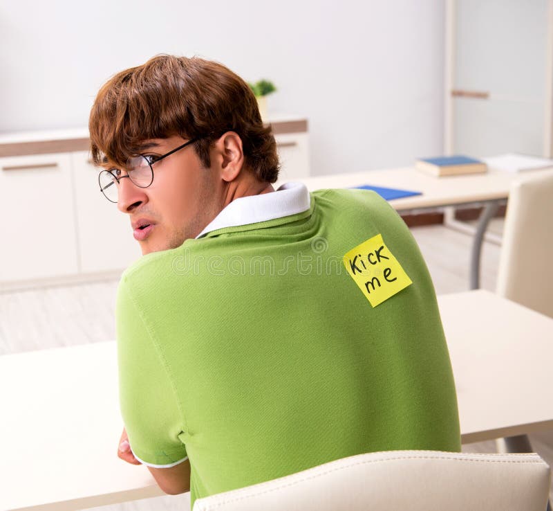 The Office Prank with Kick Me Message on Sticky Note Stock Image ...