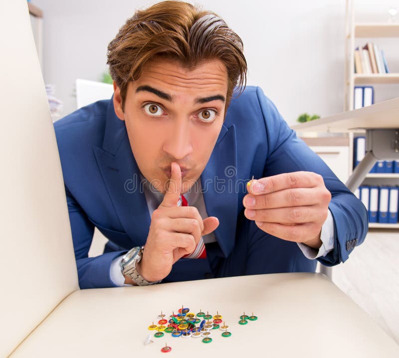 Office Prank with Sharp Thumbtacks on Chair Stock Photo - Image of ...