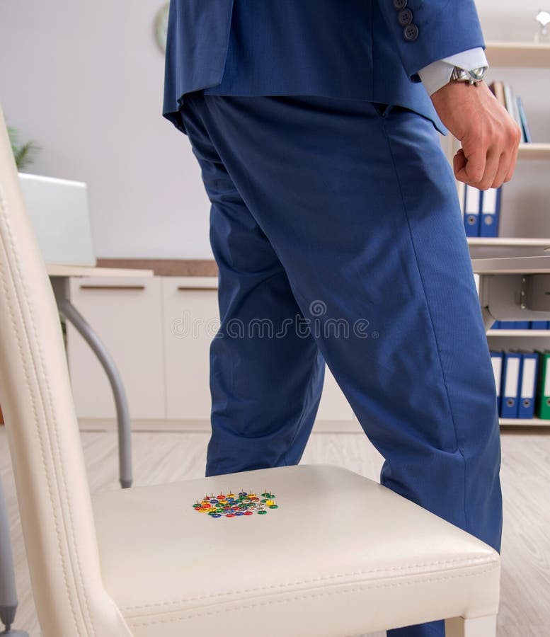 Office Prank with Sharp Thumbtacks on Chair Stock Photo - Image of ...
