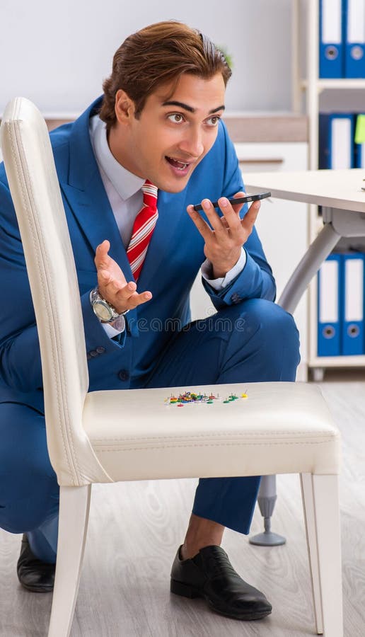 Office Prank with Sharp Thumbtacks on Chair Stock Photo - Image of ...
