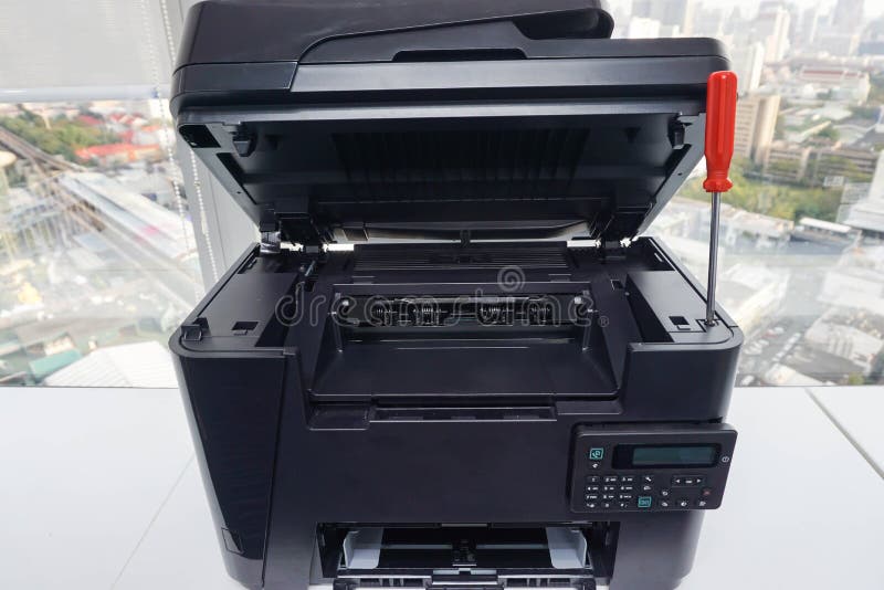 Office Printer is Repaired by Red Screwdriver Stock Photo - Image of ...