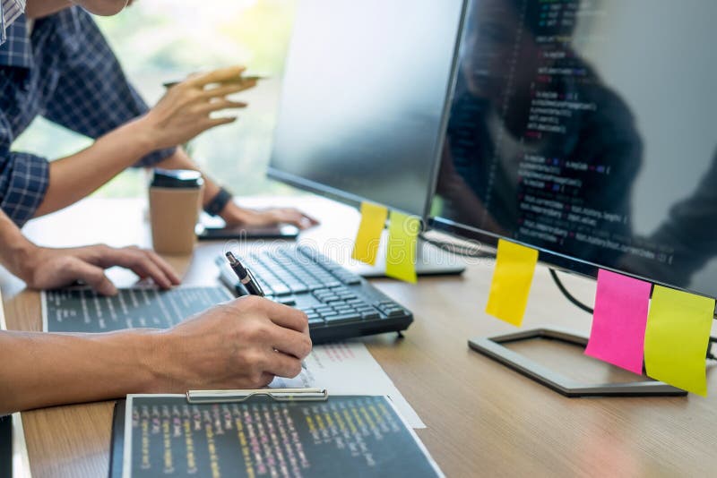 Software Development Concept, Male Programmer Looking Data on Laptop and Typing Codes on ...