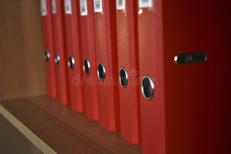 Office Red Folders on the Shelf in the Office Stock Photo - Image of ...