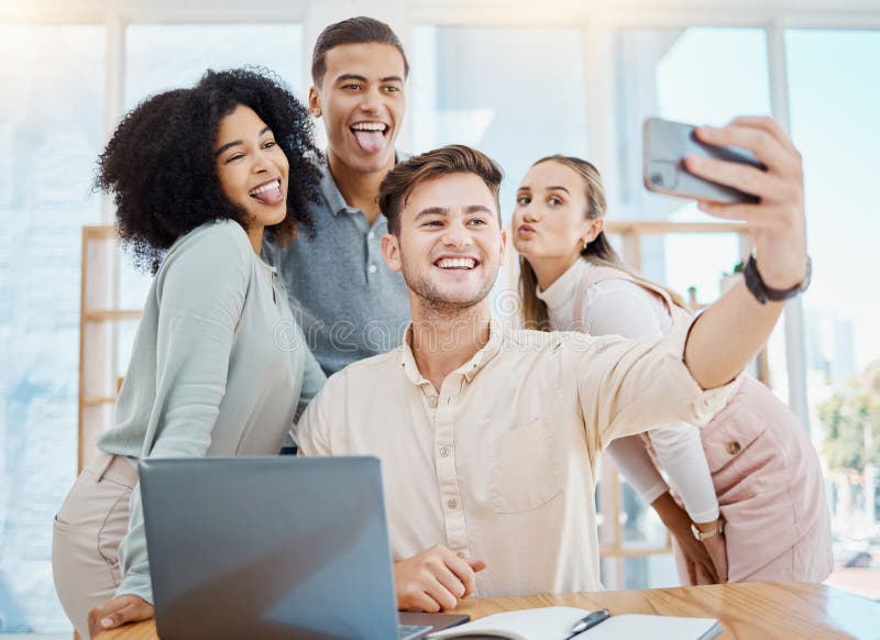 Office Selfie With Happy Corporate Colleagues Having Fun And Being Goof