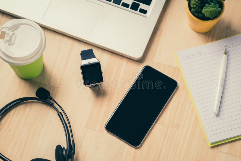 Office Setup. Close Up of Two Laptops, Tablet and a Smartwatch on a ...