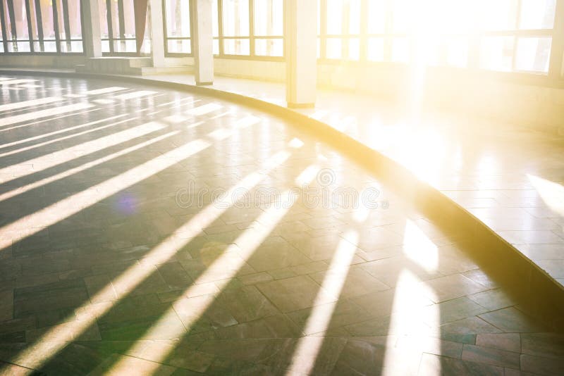 Office Space with Large Windows and Sunlight. Shadows from the Sun Fall ...
