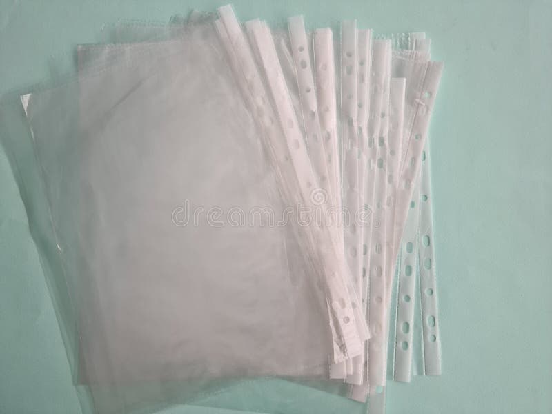 Office Stack of White Transparent Files for Documents Closeup on Blue ...