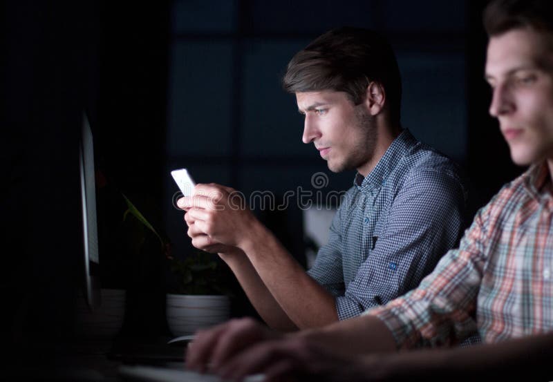 Office Staff Working on the Computer in the Dark Stock Photo - Image of ...