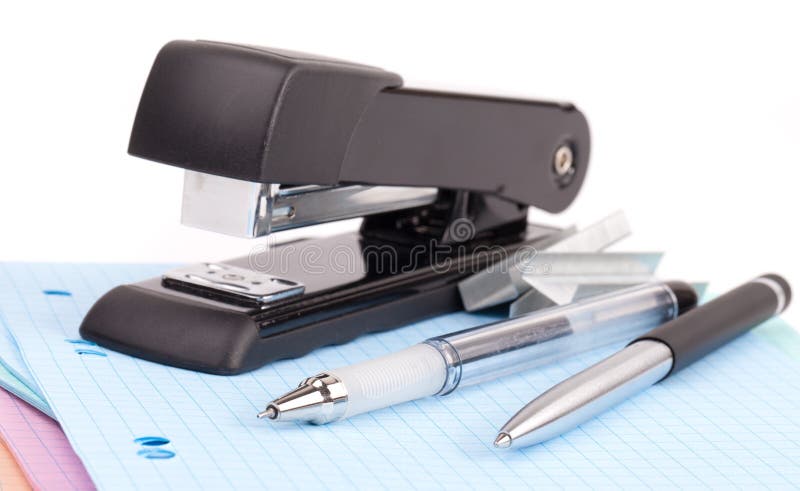 Office stapler and pen stock photo. Image of puncher - 25472826