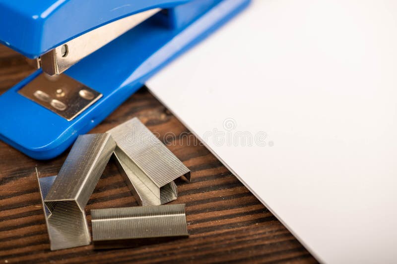 Office Stapler, Stapler Staples and White Paper on the Table, Close-up ...