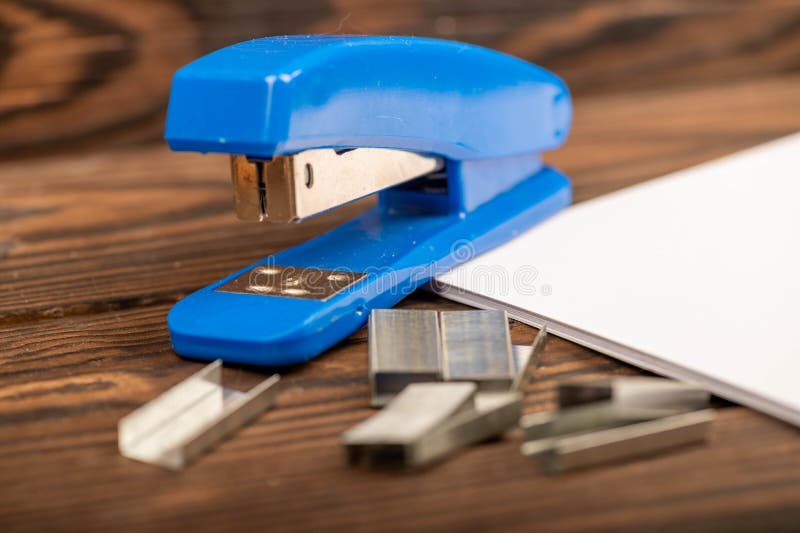 Office Stapler, Stapler Staples and White Paper on the Table, Close-up ...