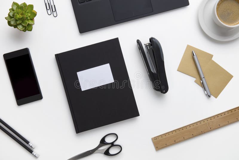 Office Supplies and Devices Arranged on White Desk Stock Photo - Image ...