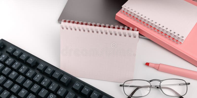 Office Supplies Over Desk with Keyboard and Glasses and Coffee Cup for ...