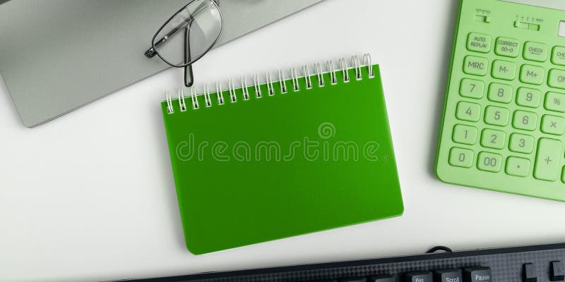 Office Supplies Over Desk with Keyboard and Glasses and Coffee Cup for ...