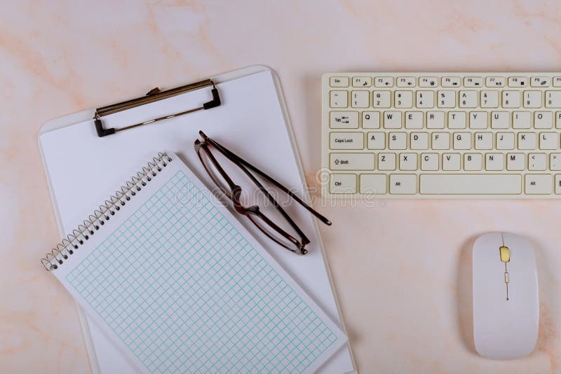 Office Table with Blank Notebook and Keyboard on a Wooden Table ...