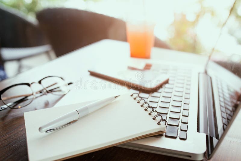 Office Table with Blank Notebook and Laptop Stock Photo - Image of ...