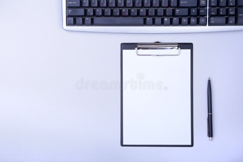 Office Table with Blank Notepad and Laptop, Supplies and Gadgets on ...