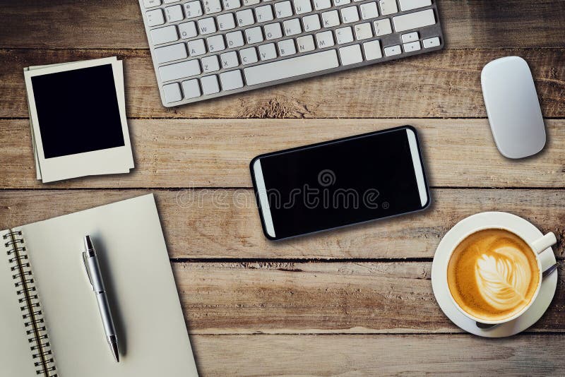 Office Table with Coffee Cup, Computer, Phone, Notebook and Pen. Stock ...