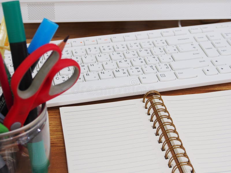 Office Table with Computer Keyboard and Note Book Stock Photo - Image ...