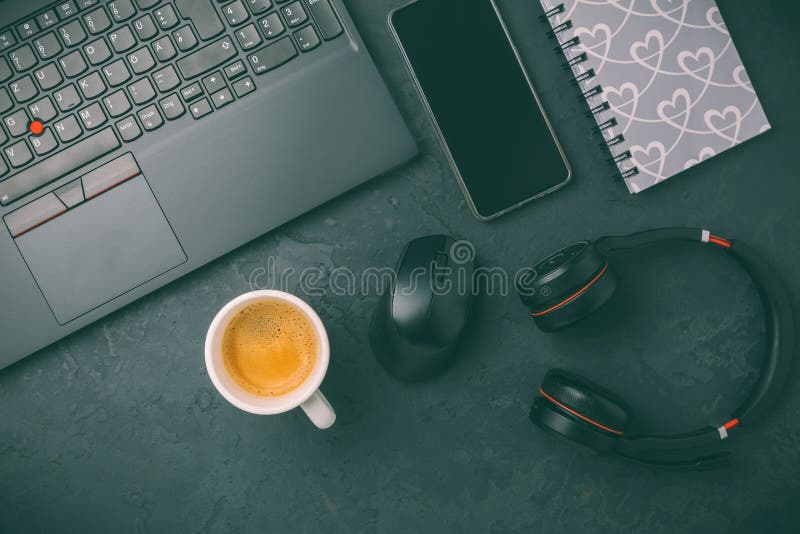 Office Table with Notebook, Computer Keyboard, Mouse, Headphones ...