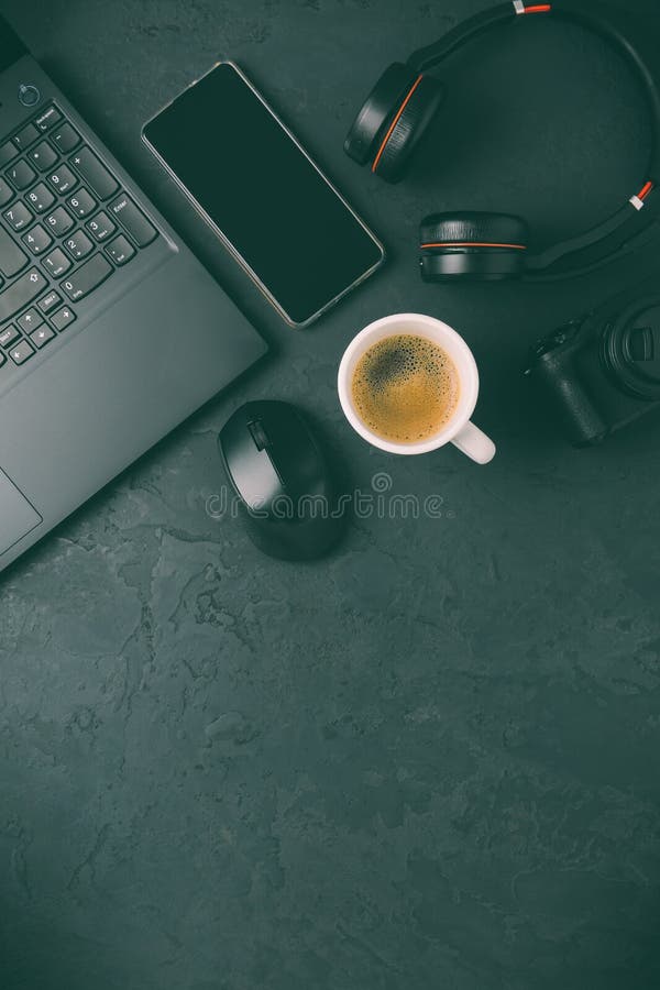 Office Table with Notebook, Computer Keyboard, Mouse, Headphones ...