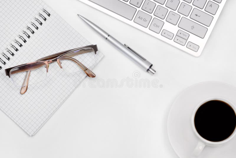 Office Table with Notepad, Computer and Coffee Cup Stock Photo - Image ...