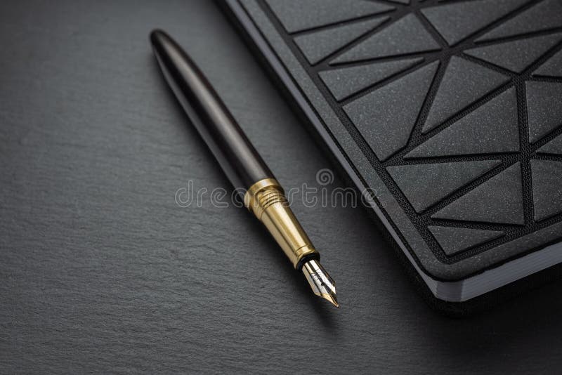 Office Table with Notepad, Keyboard and Fountain Pen Stock Photo ...