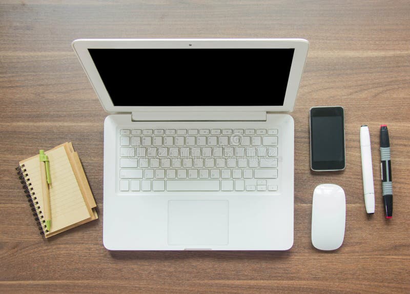 Office Table with Notepad, Laptop and Smartphone Stock Photo - Image of ...
