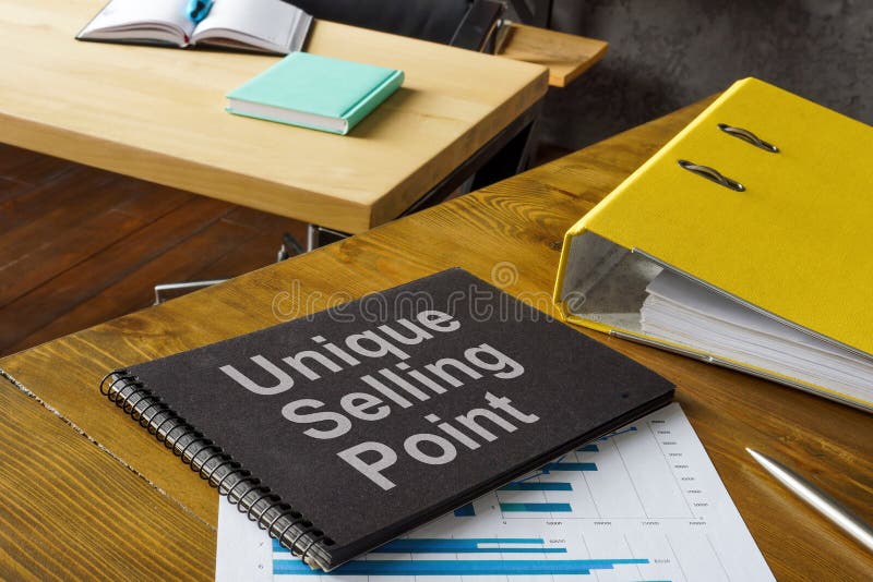 Office Table and Notepad with USP Unique Selling Point. Stock Image ...