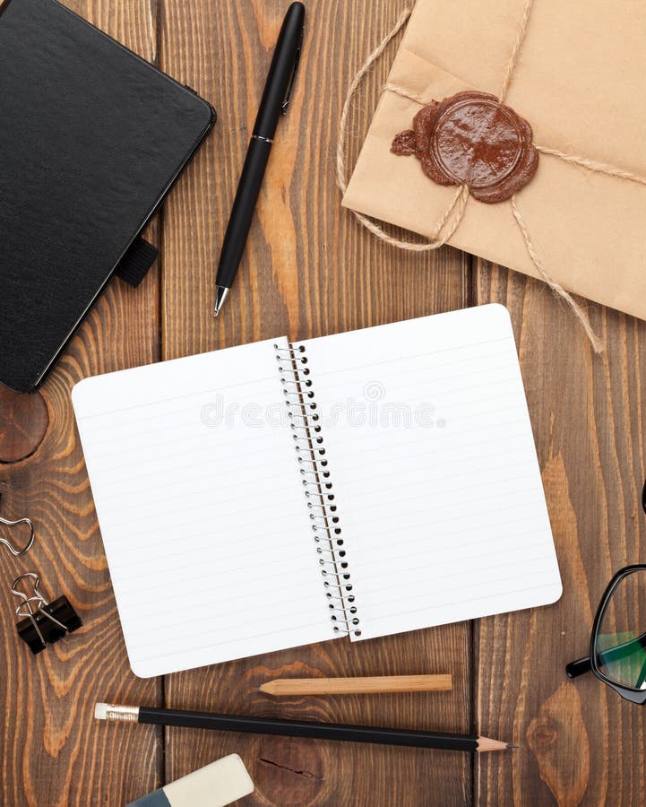Office Table with Notepad, Vintage Envelope and Supplies Stock Image ...