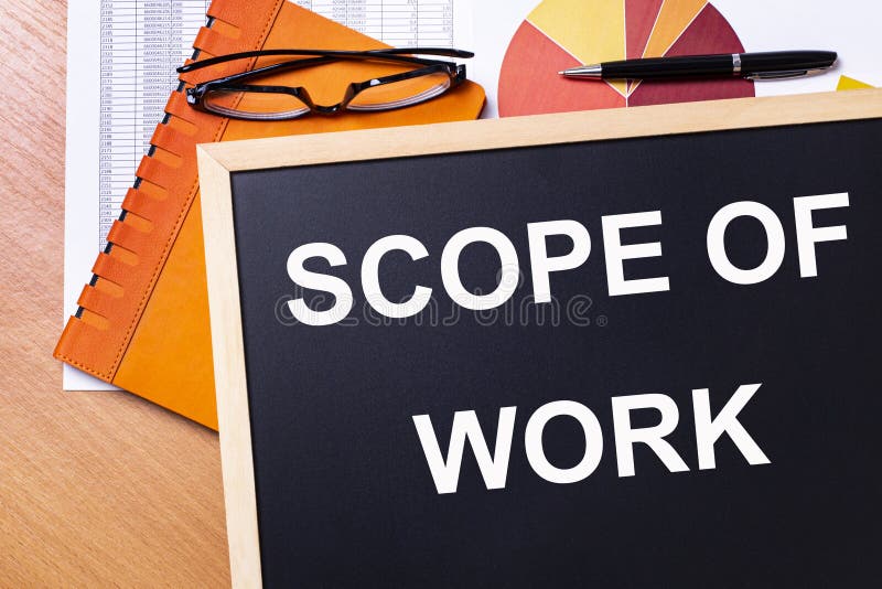 On the Office Table is an Orange Notepad, Black Glasses, a Pen and a ...